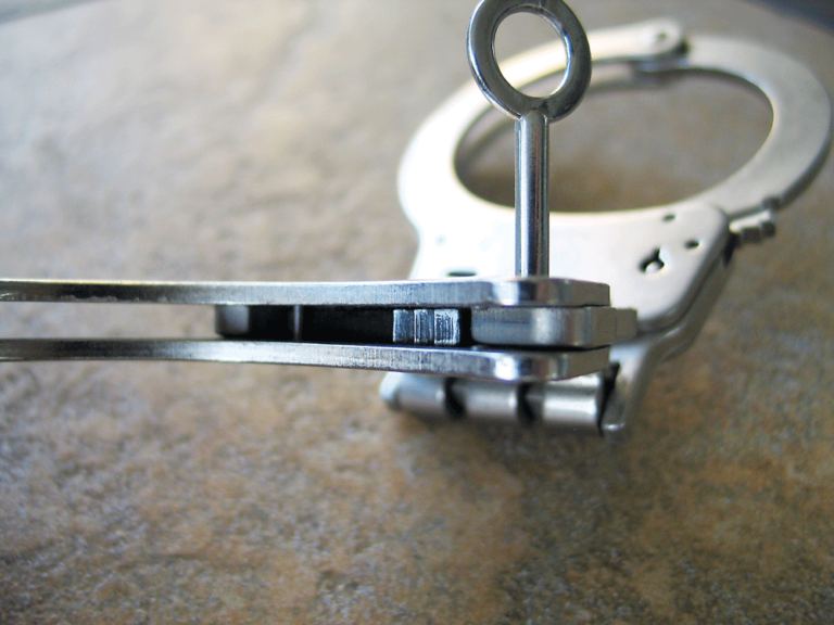 Shackled: How to Escape from a Pair of Handcuffs - American Outdoor Guide
